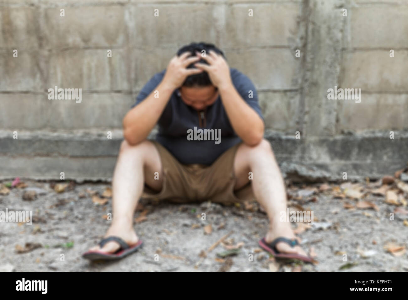 Blurred image of a man had depression and sadness Stock Photo - Alamy