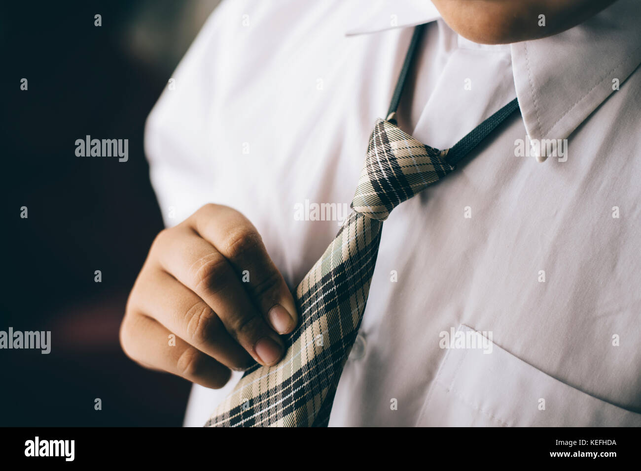 Boy wear tie hi-res stock photography and images - Alamy