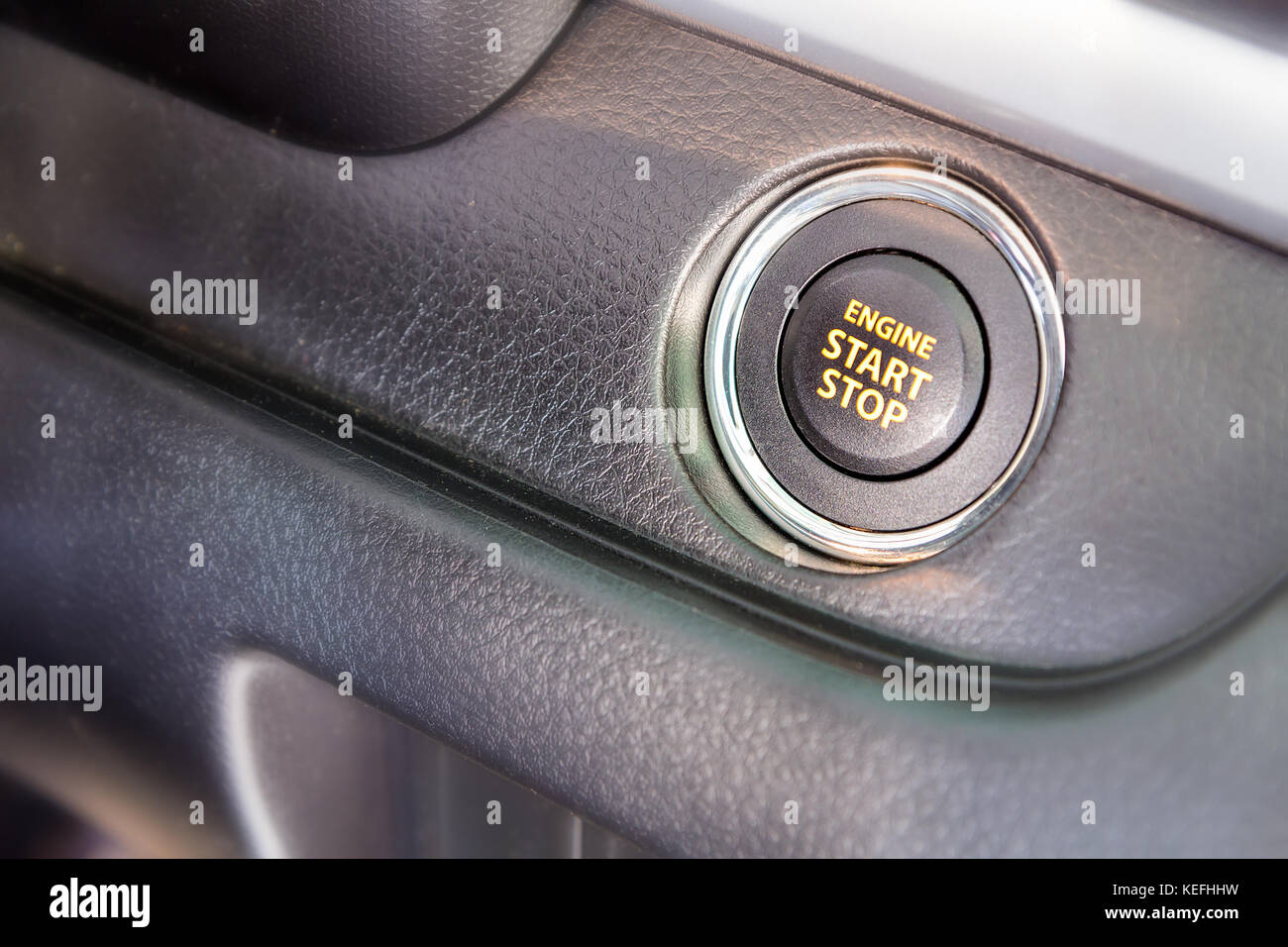 Engine start stop button of a car Stock Photo - Alamy