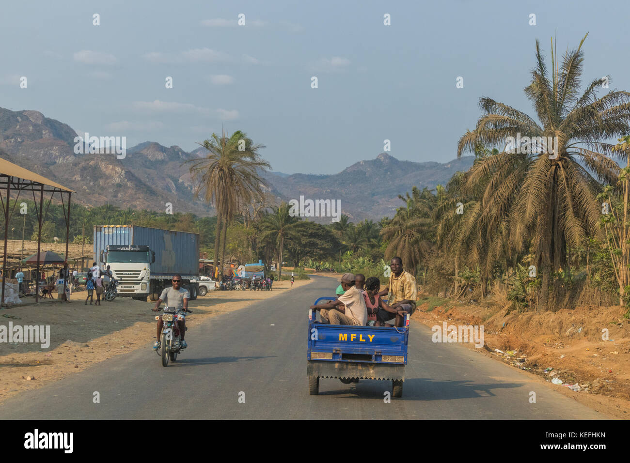 SUMBE/ANGOLA 10 OCT 2017 African family to travel by motorcycle. Angola ...