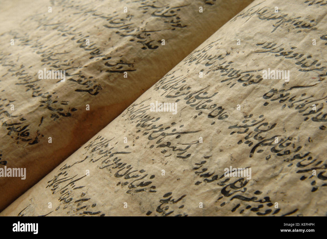 ancient open book in arabic. old arabic manuscripts Stock Photo - Alamy
