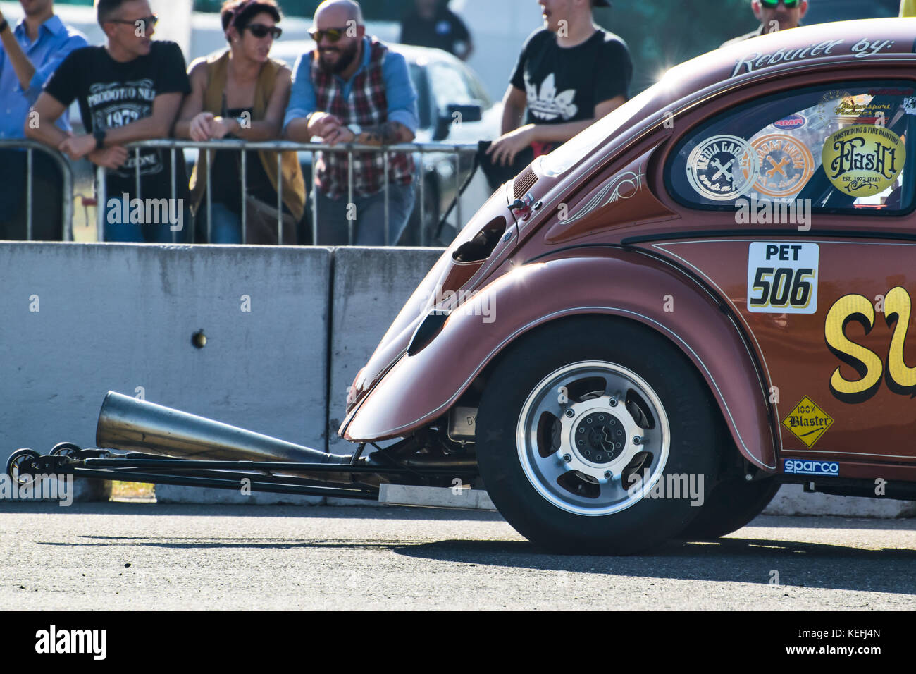 a view on details of a colorful classic wolkswage beetle dragster car ...