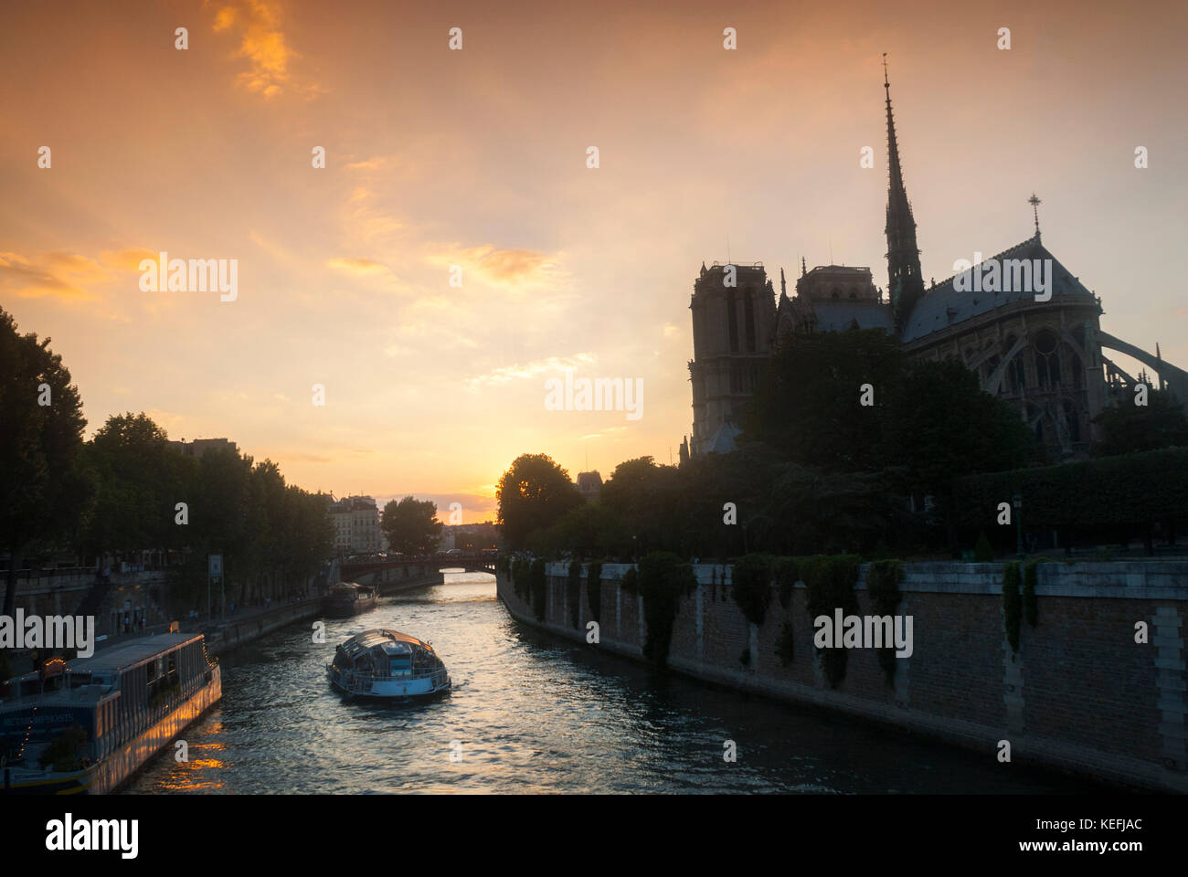 Sunset over Paris, the Seine and Notre Dame, Paris, France Stock Photo ...
