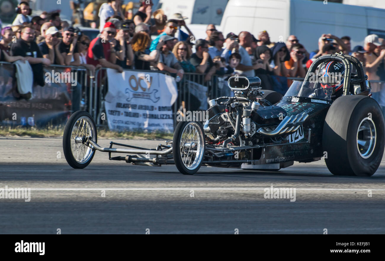 a dragster car on circuit ready to speed during a motor show Stock ...