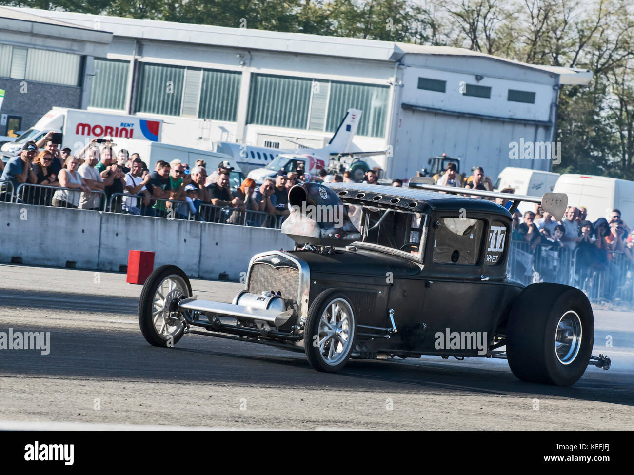 a dragster car on circuit ready to speed during a motor show Stock ...