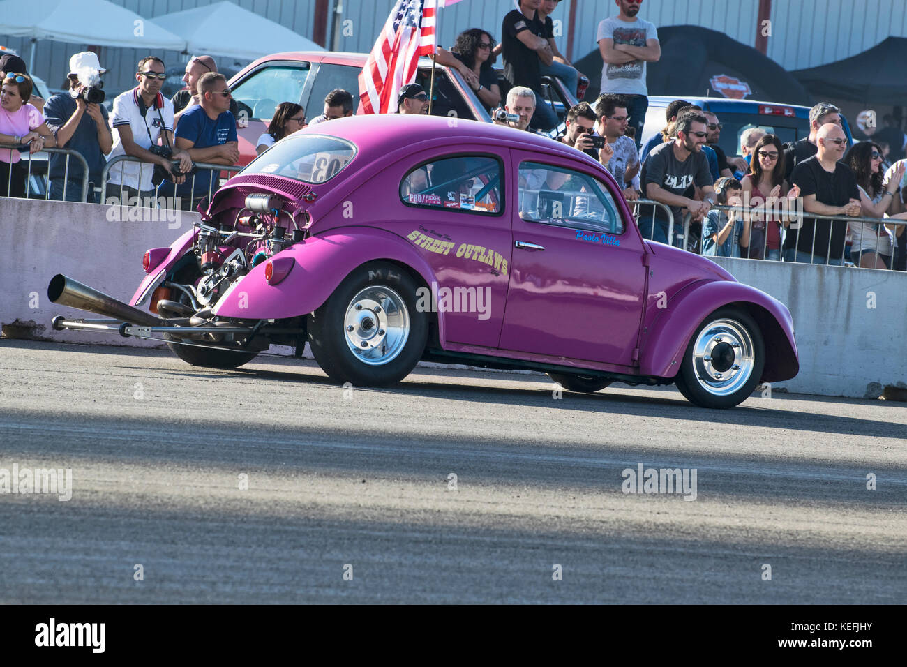 a view on details of a colorful classic wolkswage beetle dragster car ...