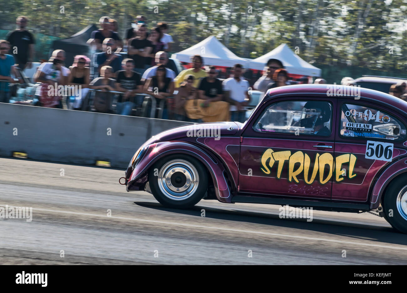 a view on details of a colorful classic wolkswage beetle dragster car ...
