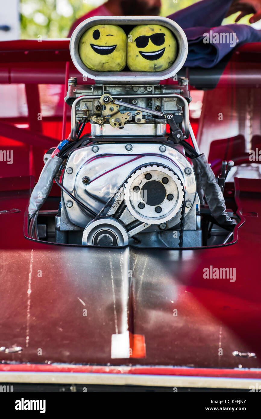 a frontal view of the engine of a dragster car at motor show in italy ...