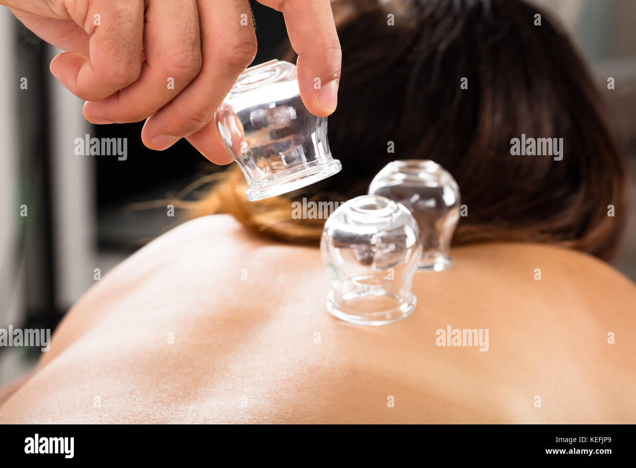 Young chinese man cups hi-res stock photography and images - Alamy