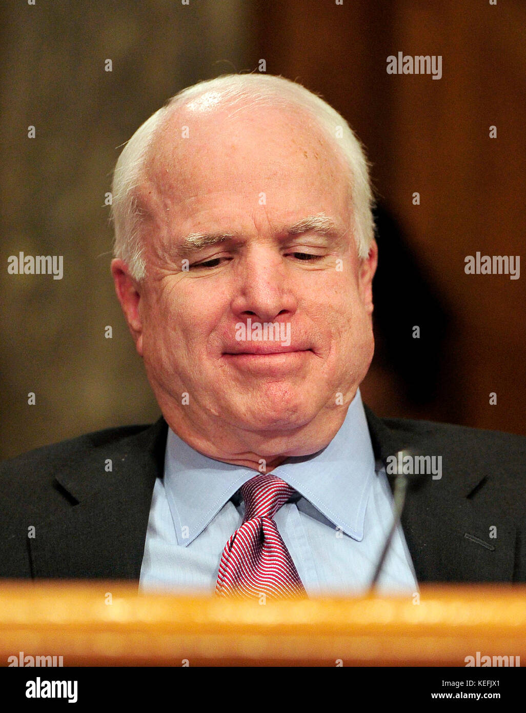 United States Senator John McCain (Republican of Arizona) listens as U ...