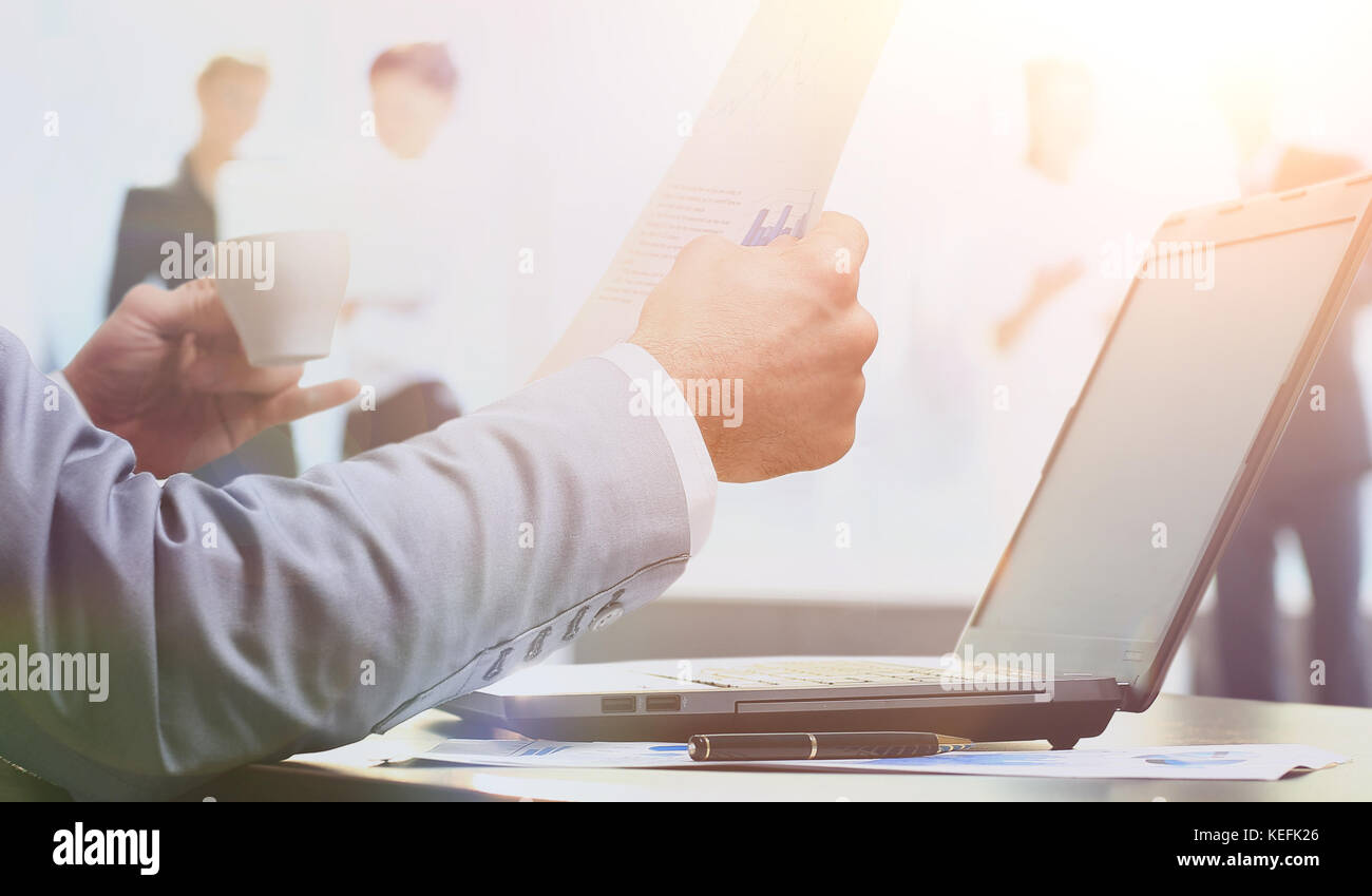 Businessman working in the office. early in the morning Stock Photo - Alamy