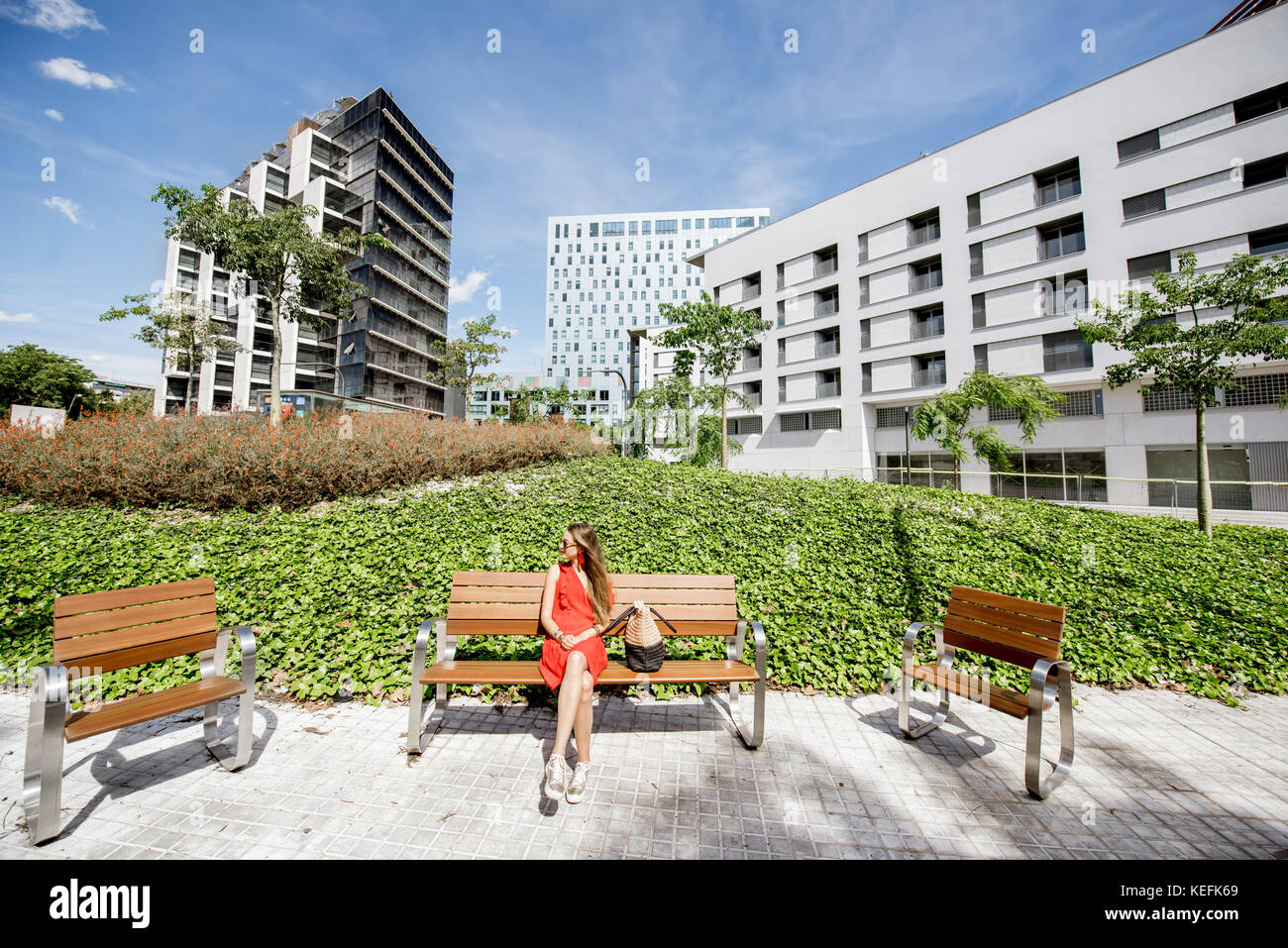 Woman at the modern office courtyard Stock Photo - Alamy