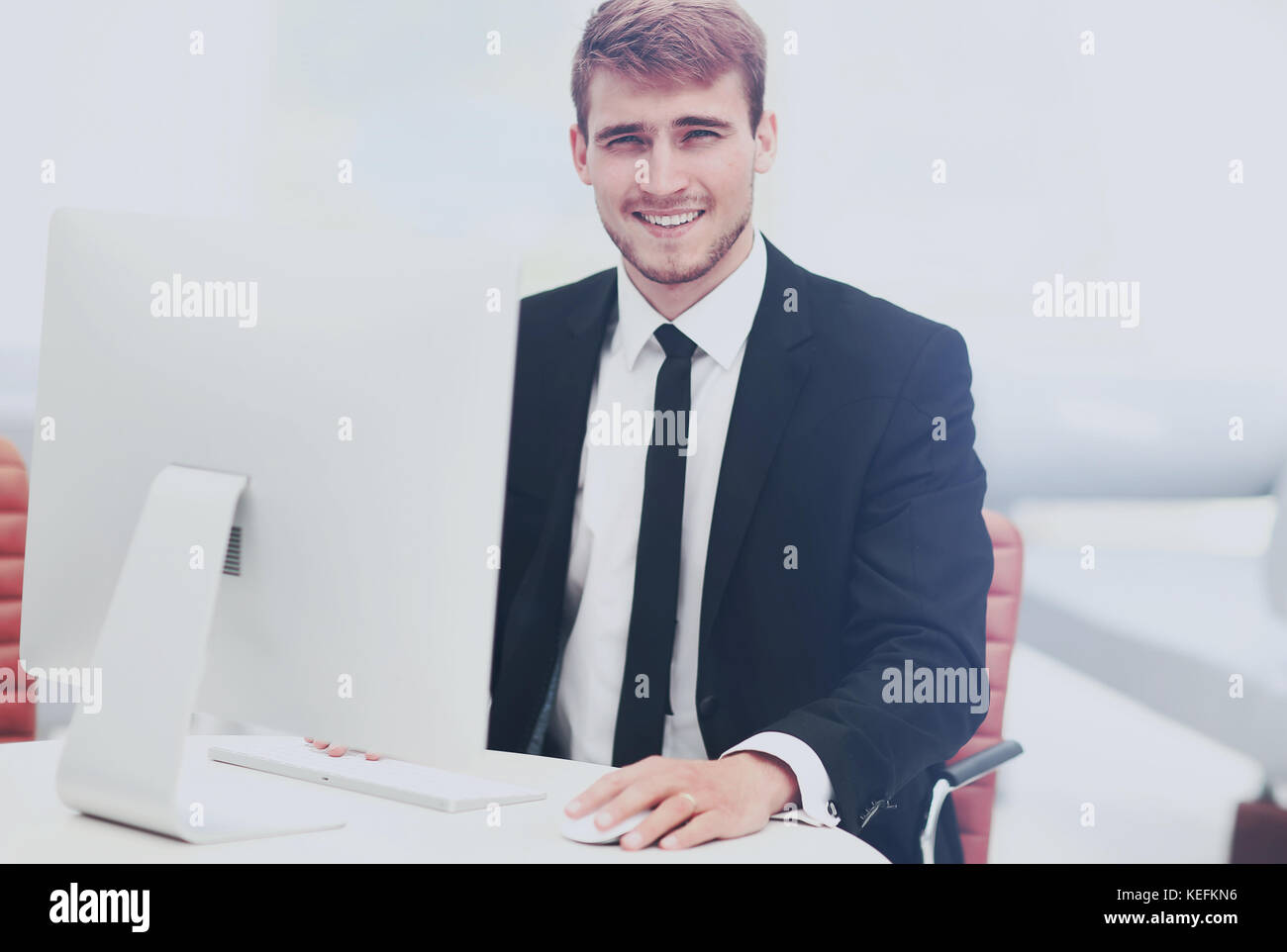 Successful business man at the workplace Stock Photo - Alamy