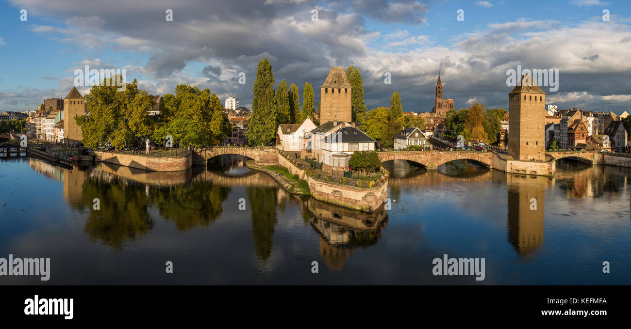 Evening panorama of Strasbourg, the medieval bridge, towers and ...