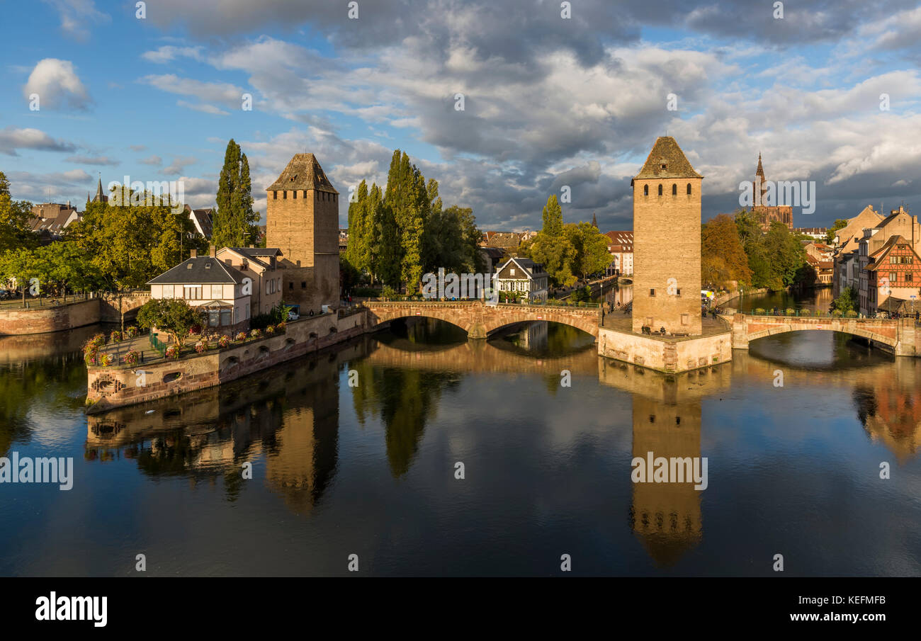 Evening panorama of Strasbourg, the medieval bridge, towers and ...