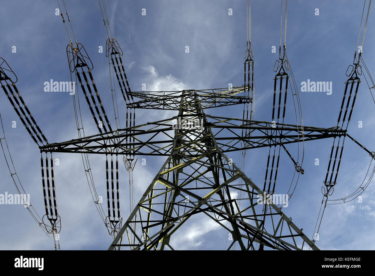 A PYLON AND HIGH-VOLTAGE POWER LINES, SKY Stock Photo - Alamy