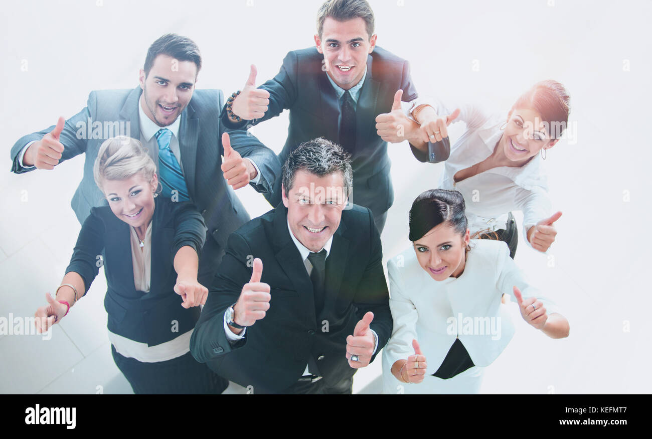 Top view of executives smiling and pointing Stock Photo - Alamy