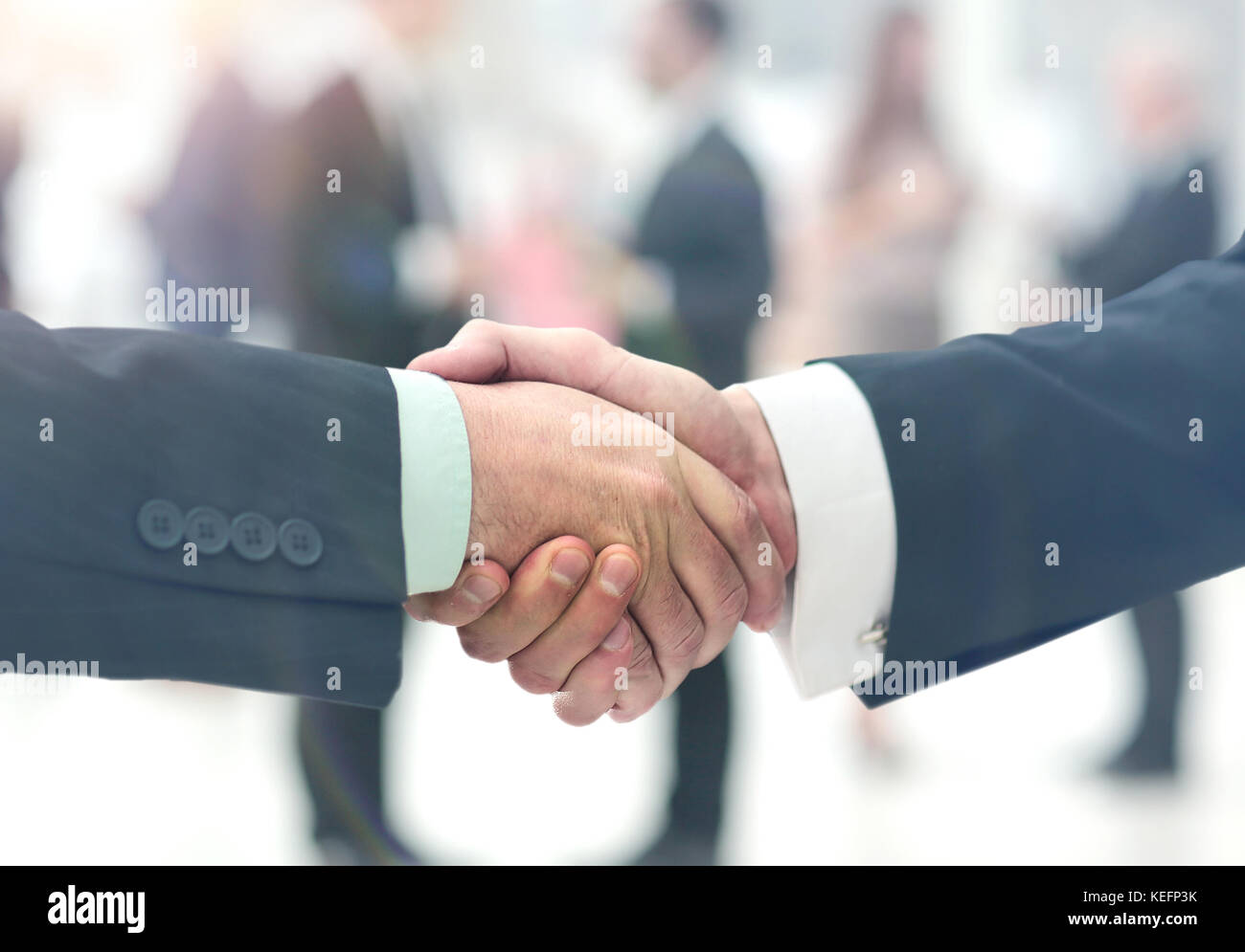 Business handshake of two business man Stock Photo - Alamy