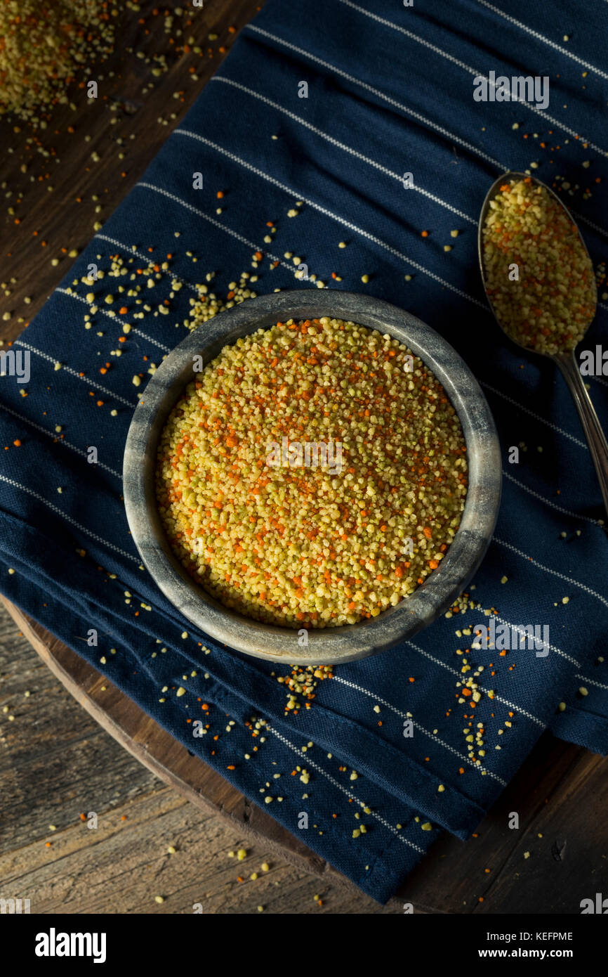 Raw Organic Dry Tri Color Couscous in a Bowl Stock Photo - Alamy