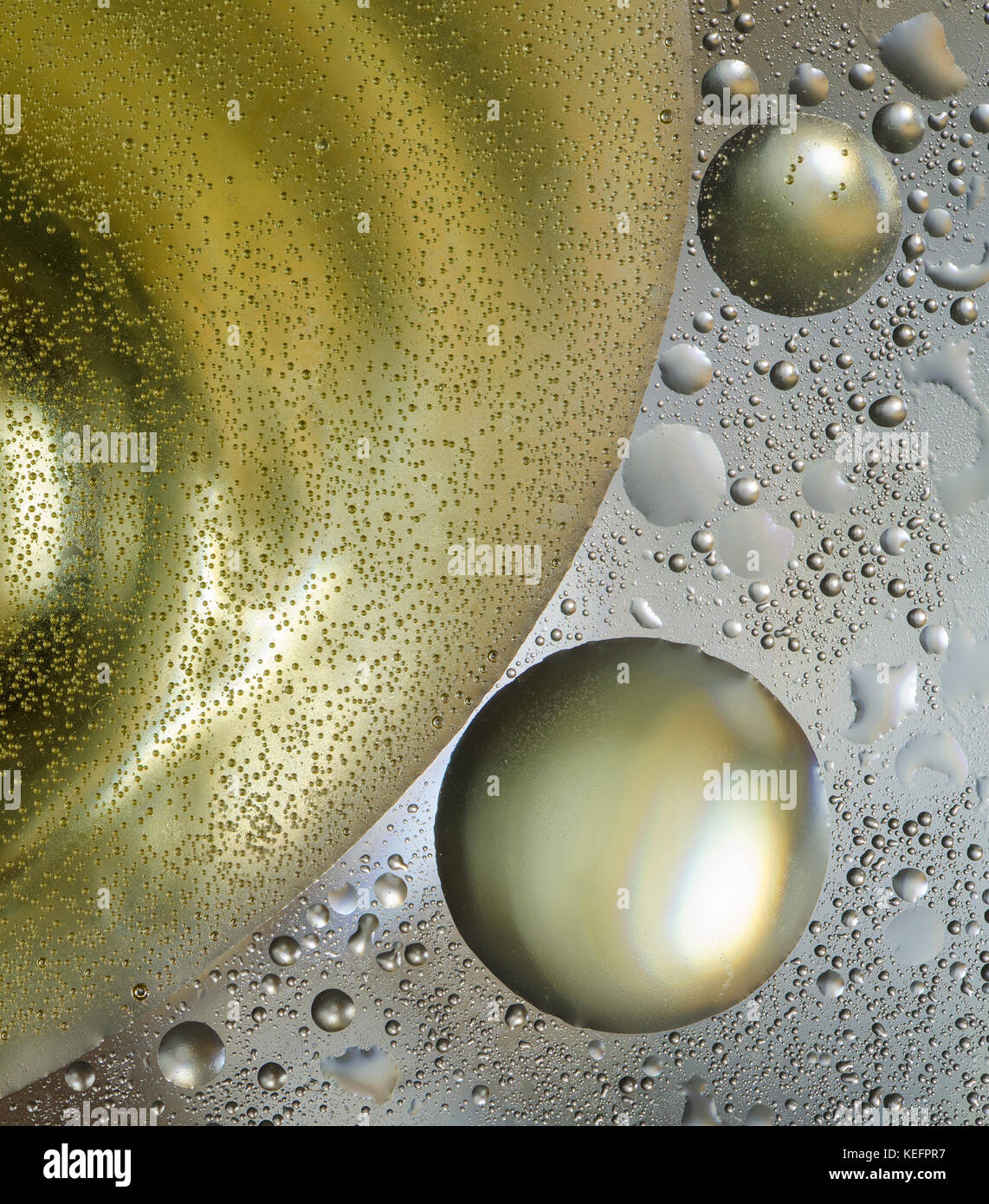 oil drops on water Stock Photo - Alamy