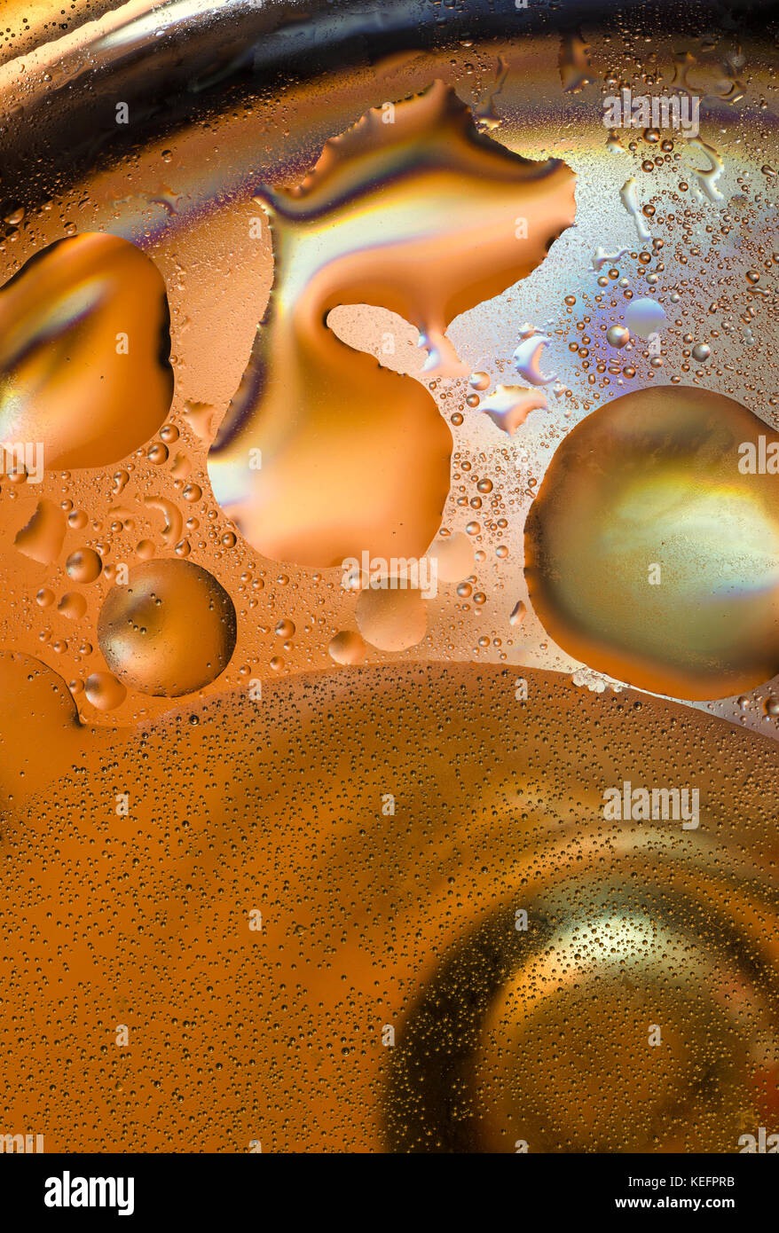 oil drops on water Stock Photo - Alamy
