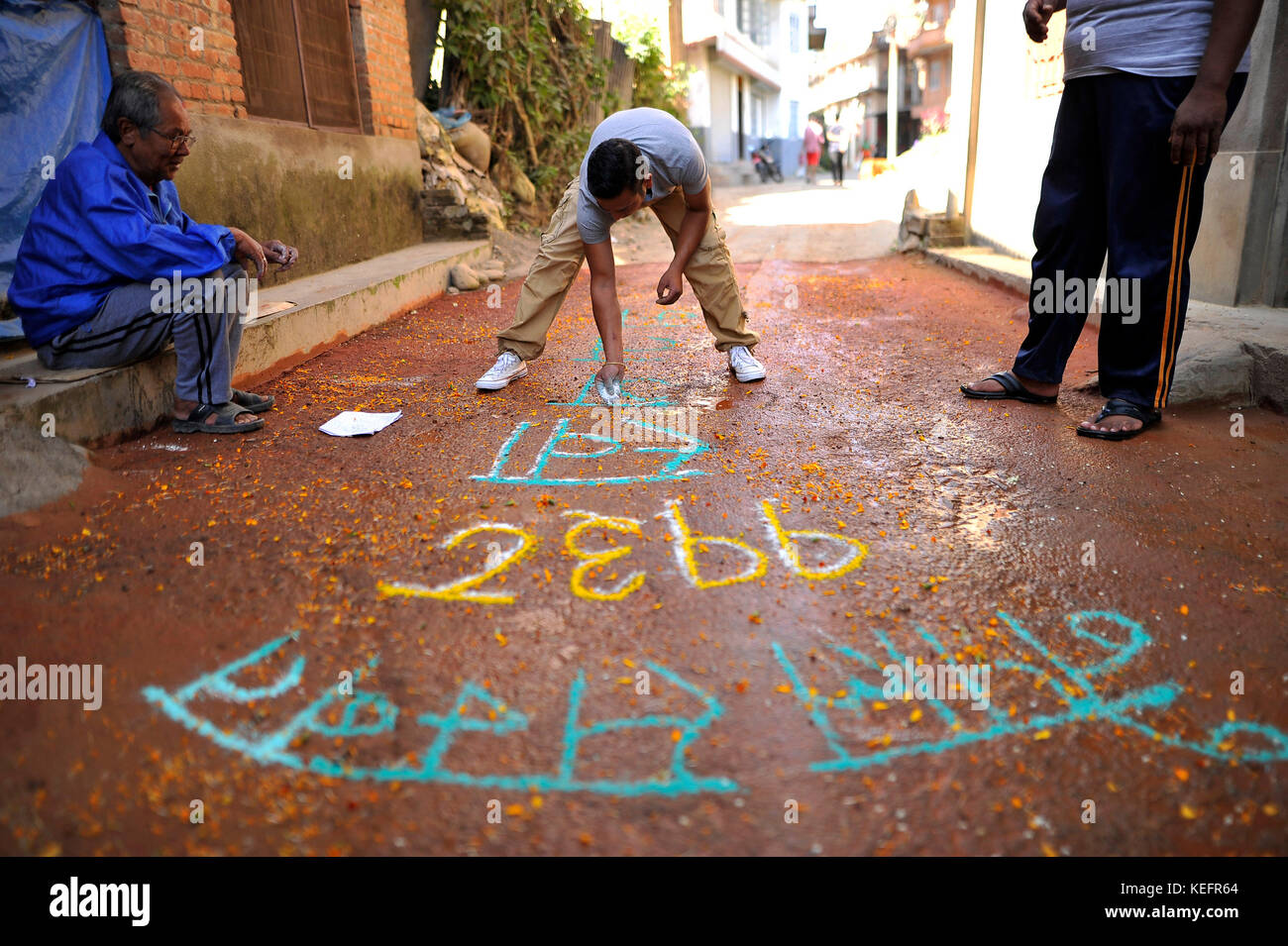 A man making mandala to welcome the parade of Nhu Dan (the Newari New ...