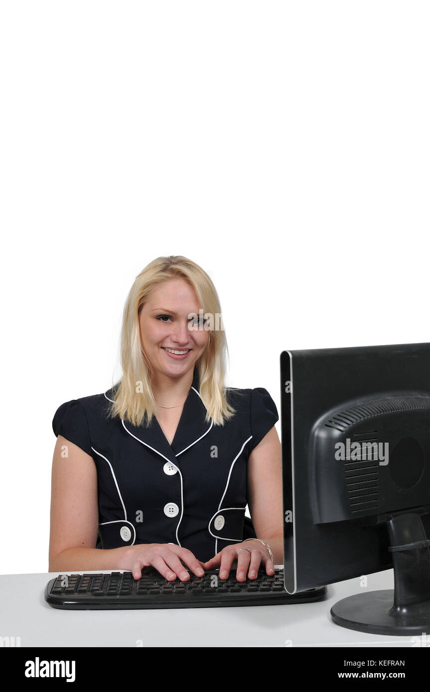 Woman executive or manager using a desktop computer Stock Photo - Alamy