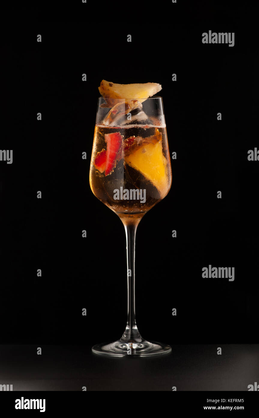 one glass beaker with a fruity drink on a dark background Stock Photo ...