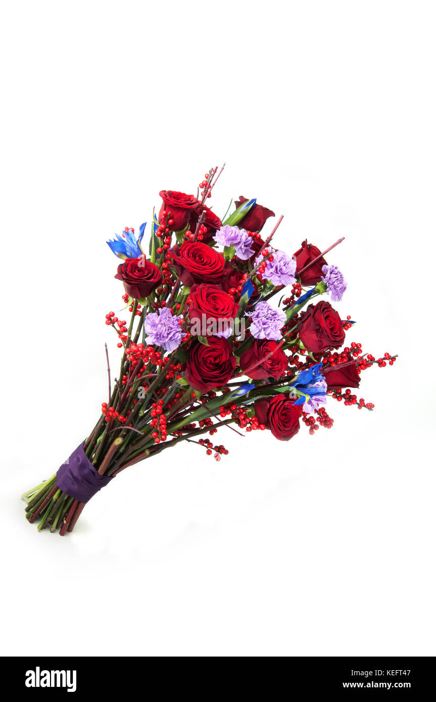 a bouquet of red roses and assorted flowers associated tape on white ...