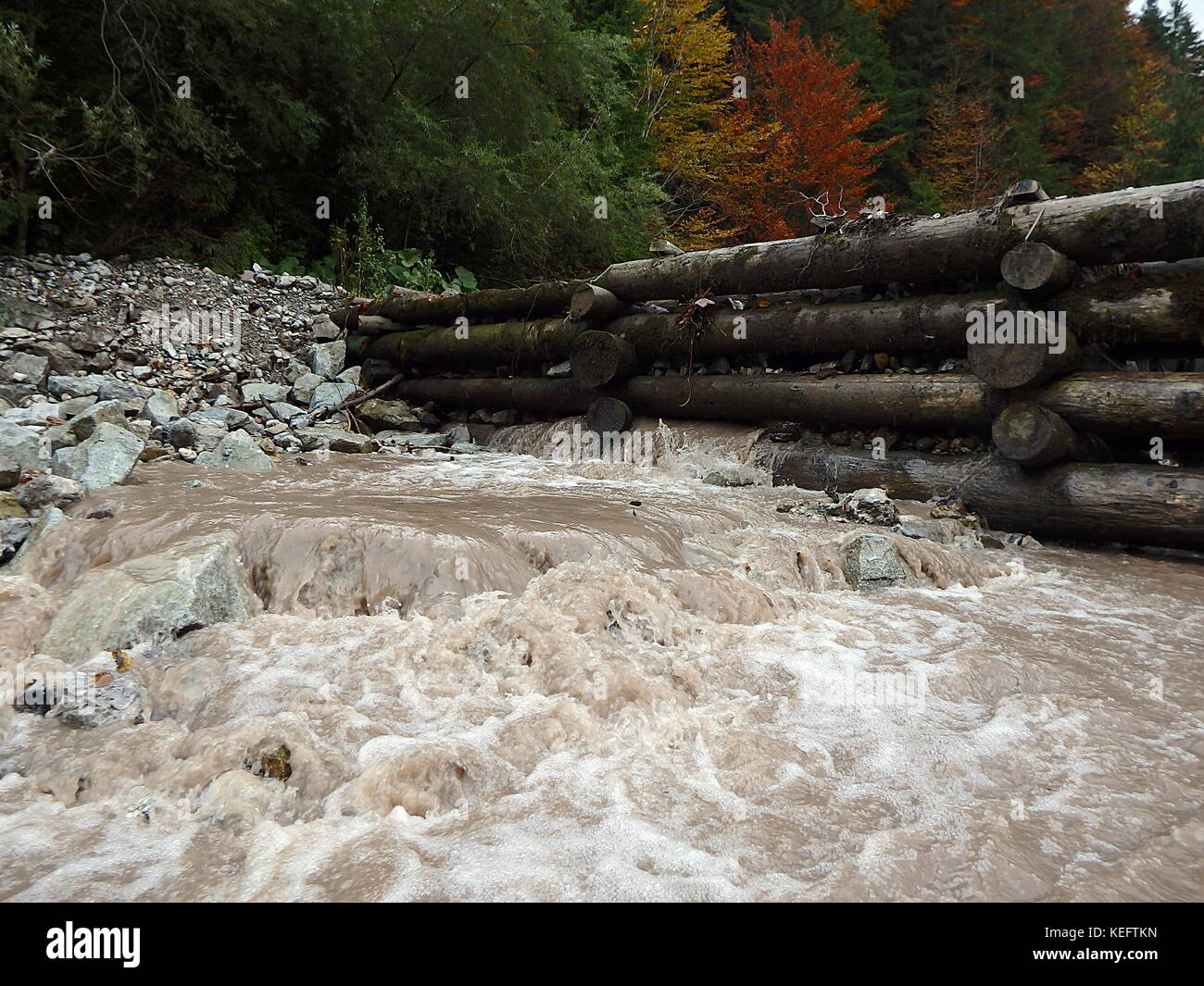 Wooden dam on a mountain river, Traditional structure for floating ...