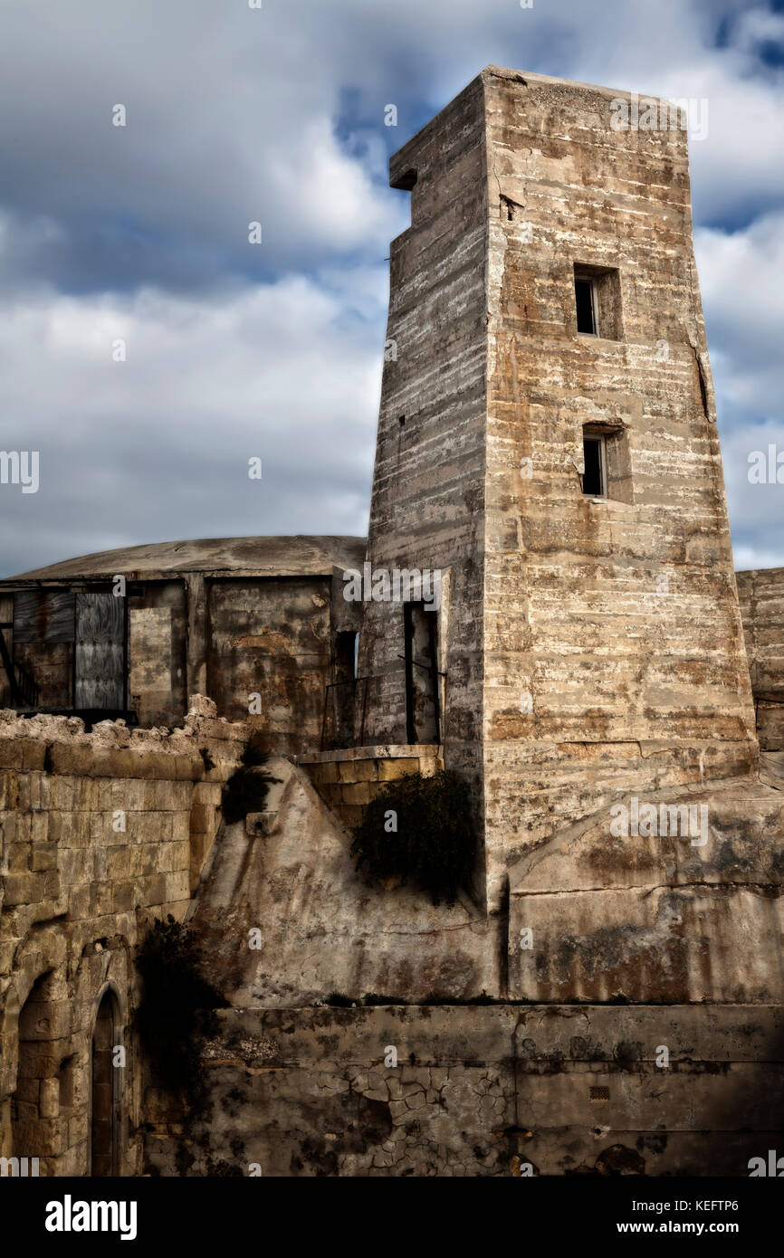 WWII gun defense tower at Fort Ricasoli in Malta Stock Photo - Alamy