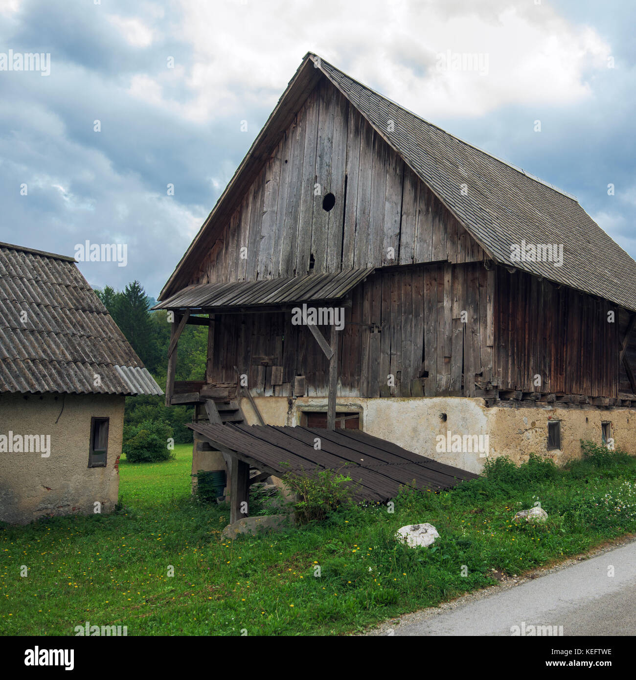 Typical traditional Alpine barn shed located in Slovenian touristic ...
