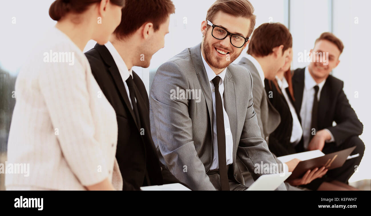 Business Team Having Informal Meeting In Office Stock Photo - Alamy