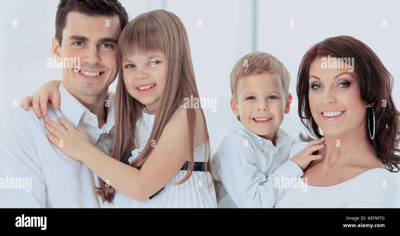 Beautiful happy family - isolated over a white background Stock Photo ...