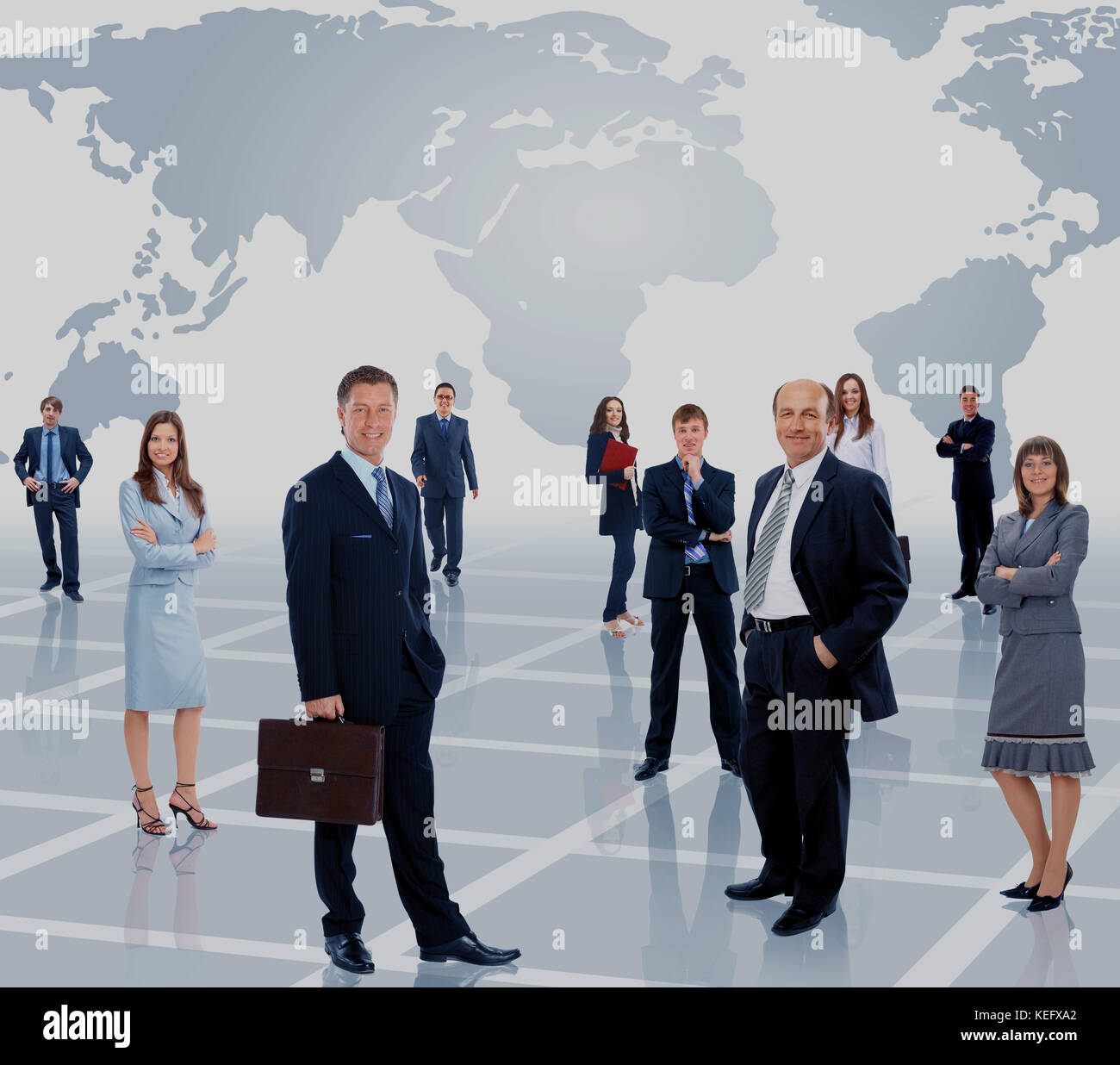 Businessmen standing in front of an earth map Stock Photo - Alamy