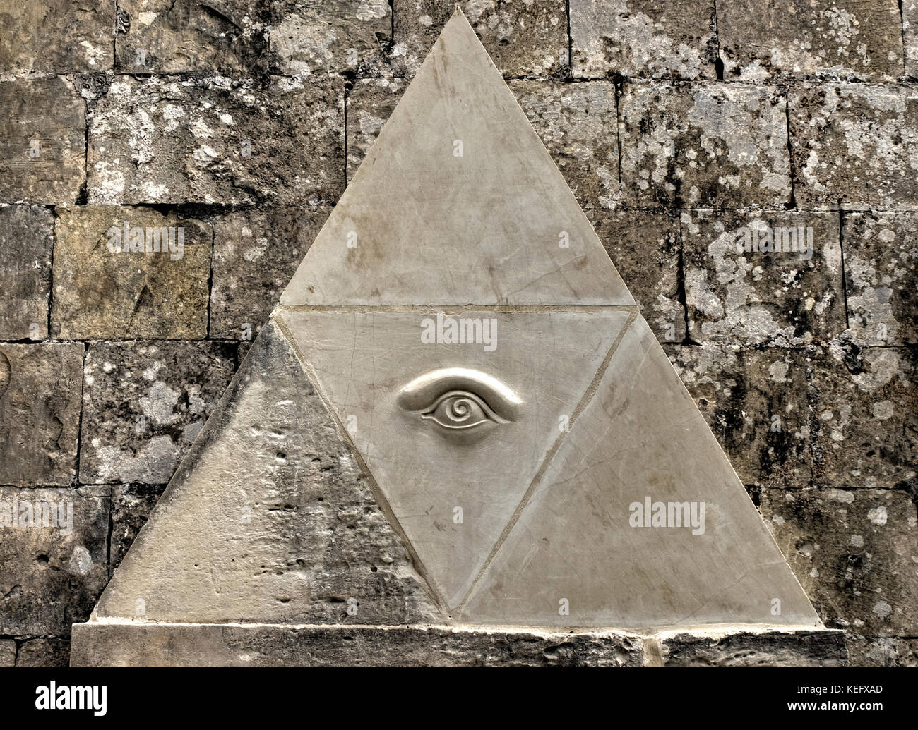 Eye of Providence symbol etched in limestone Stock Photo - Alamy