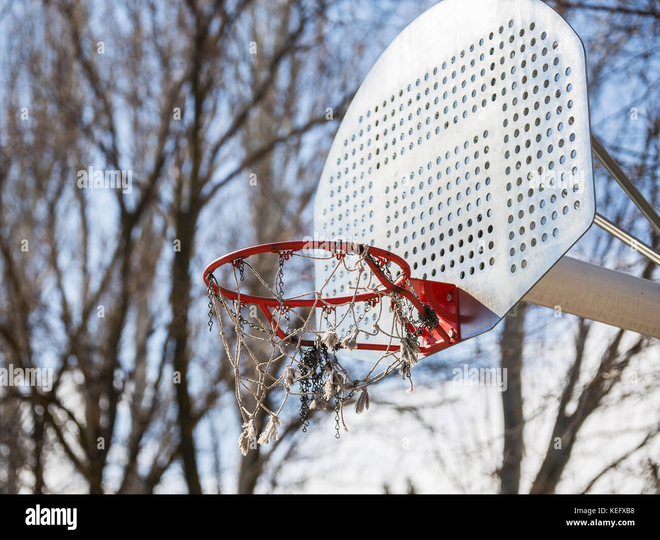 alone Basketball hoop in the park Stock Photo - Alamy