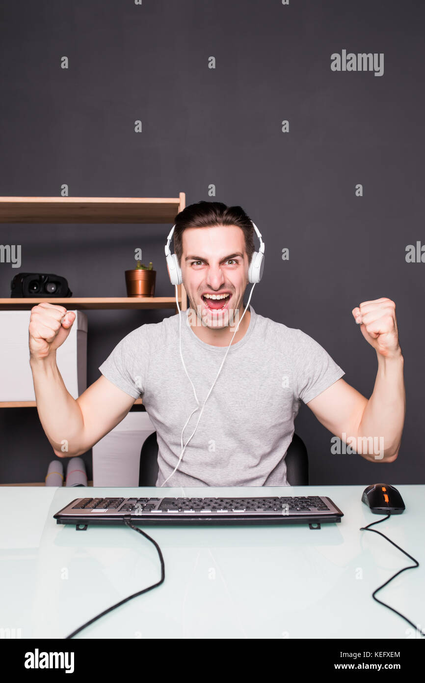 Back view young gamer winning hi-res stock photography and images - Alamy