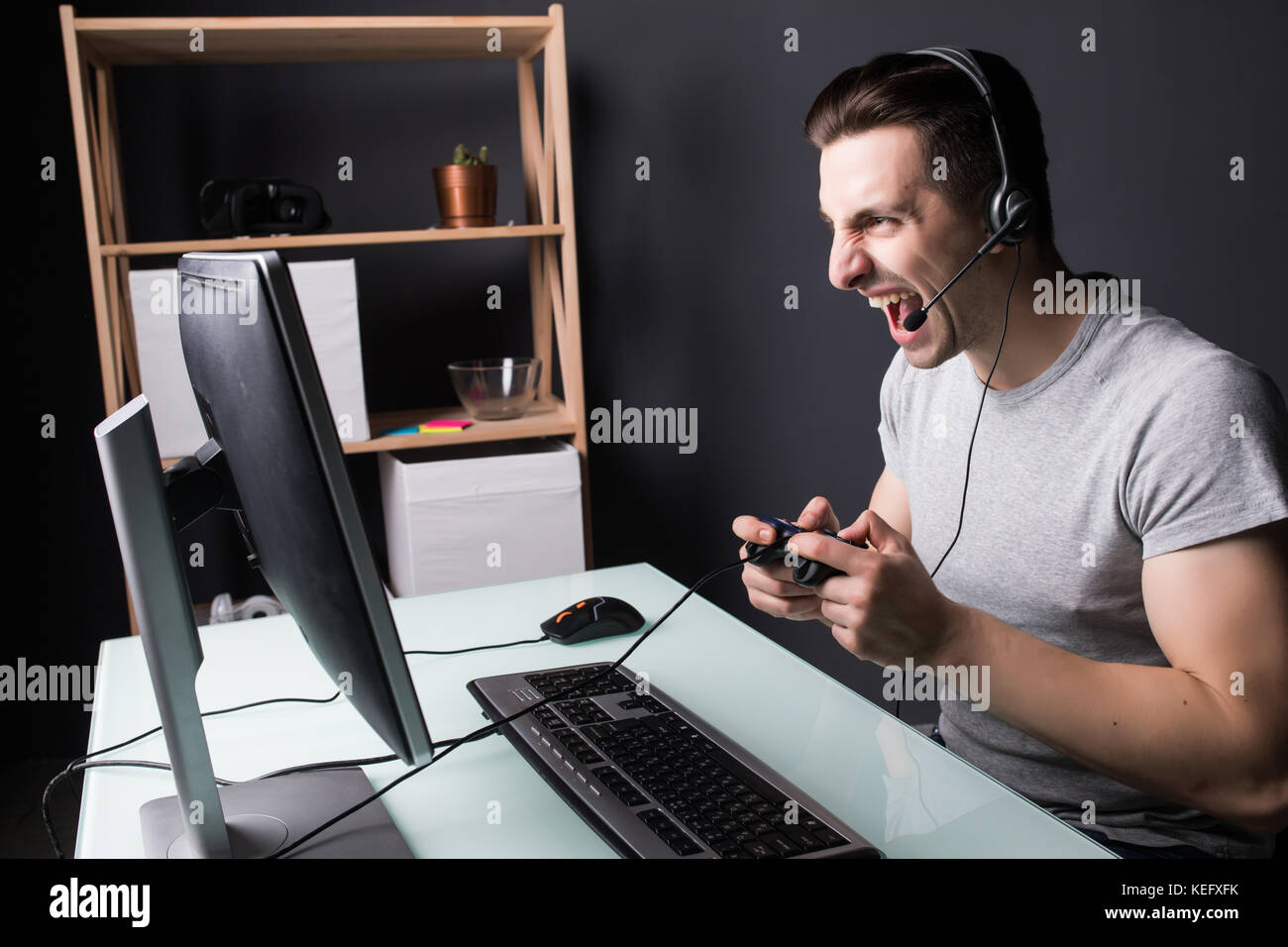 technology, gaming, entertainment, let's play and people concept ...