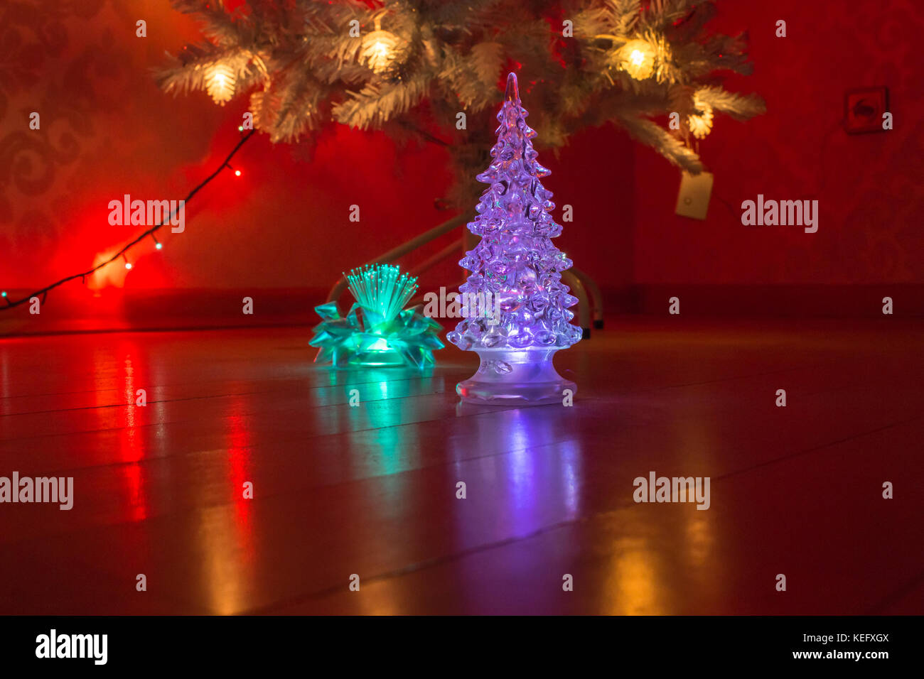 magic small decorative glass tree with illumination Stock Photo - Alamy