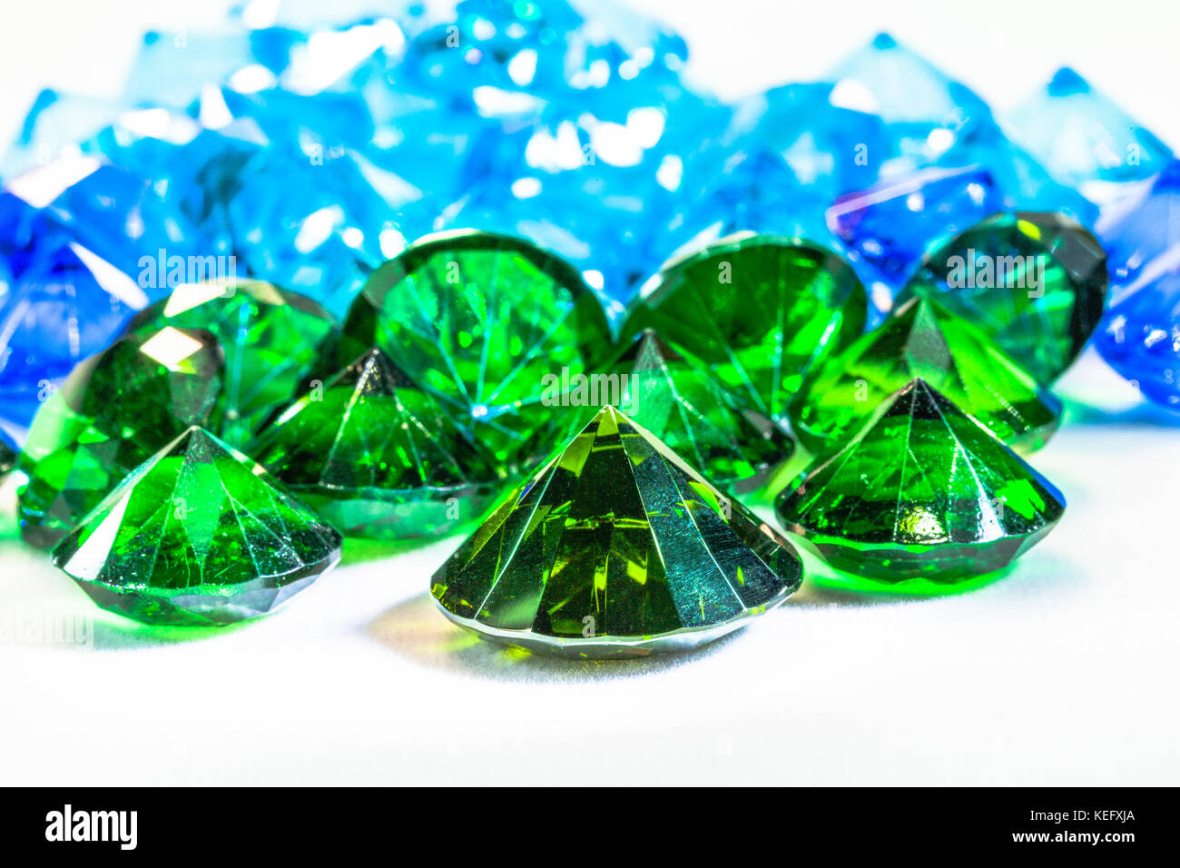 green diamond gemstones on white flannel blue diamonds on the back ...