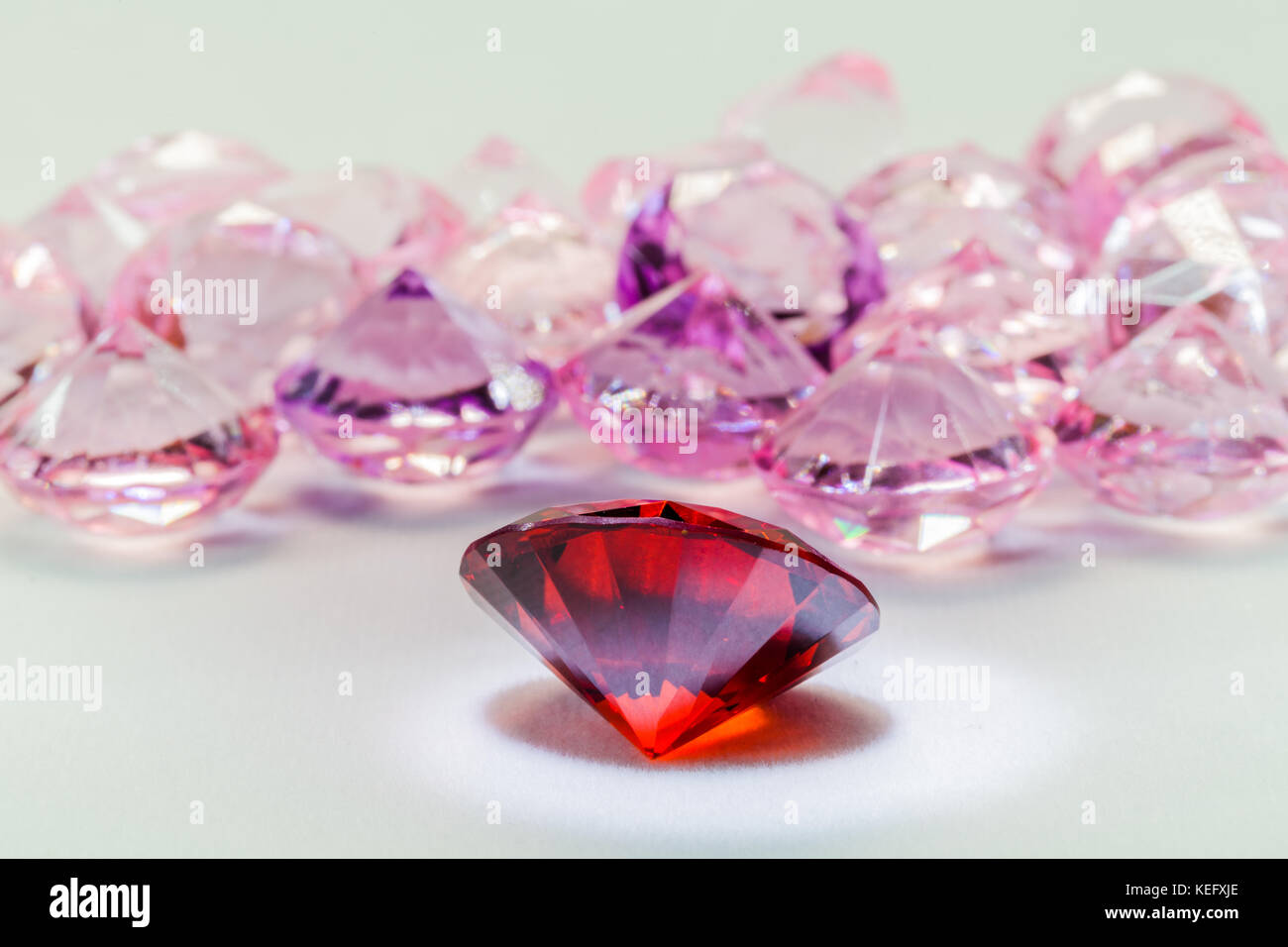 red diamond gemstones on white flannel Stock Photo - Alamy