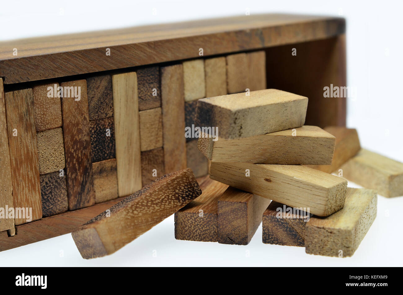 Blocks wood Jenga game on white background Stock Photo - Alamy