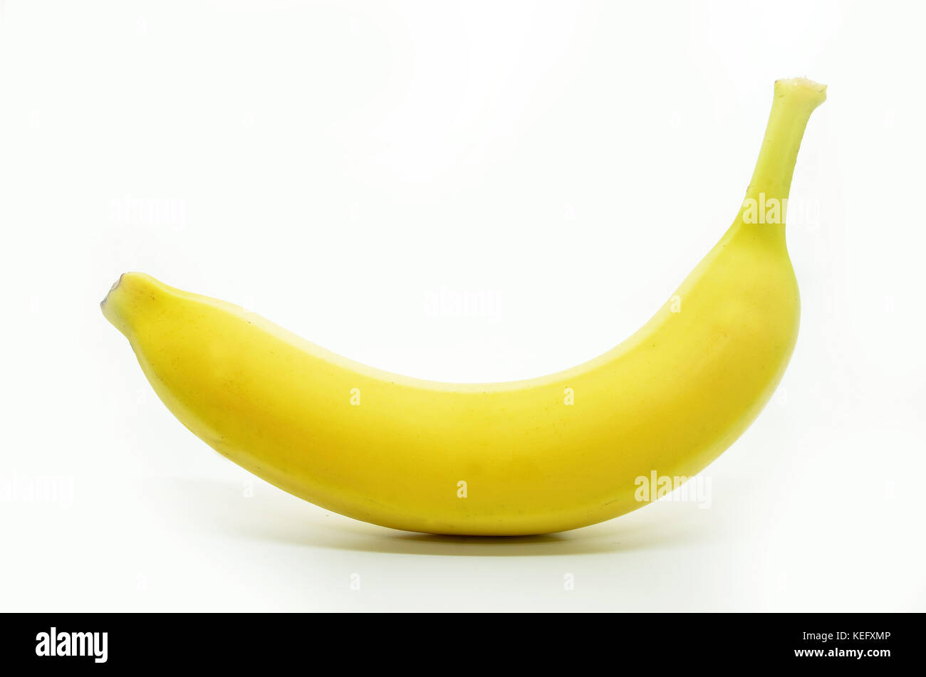 Fresh and organic banana fruit isolated background Stock Photo - Alamy
