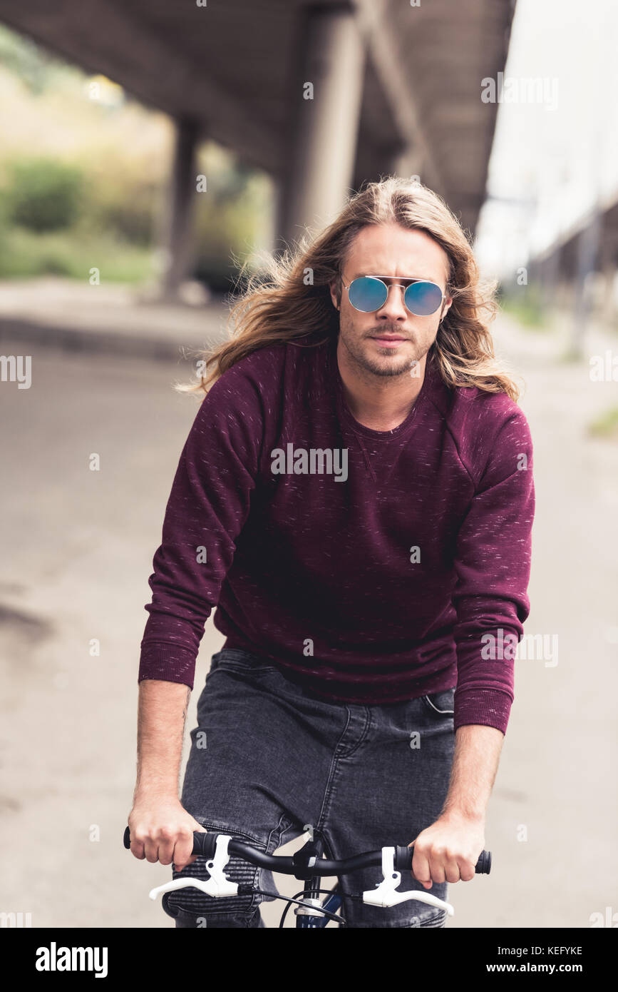 Man riding vintage bicycle hi-res stock photography and images - Alamy