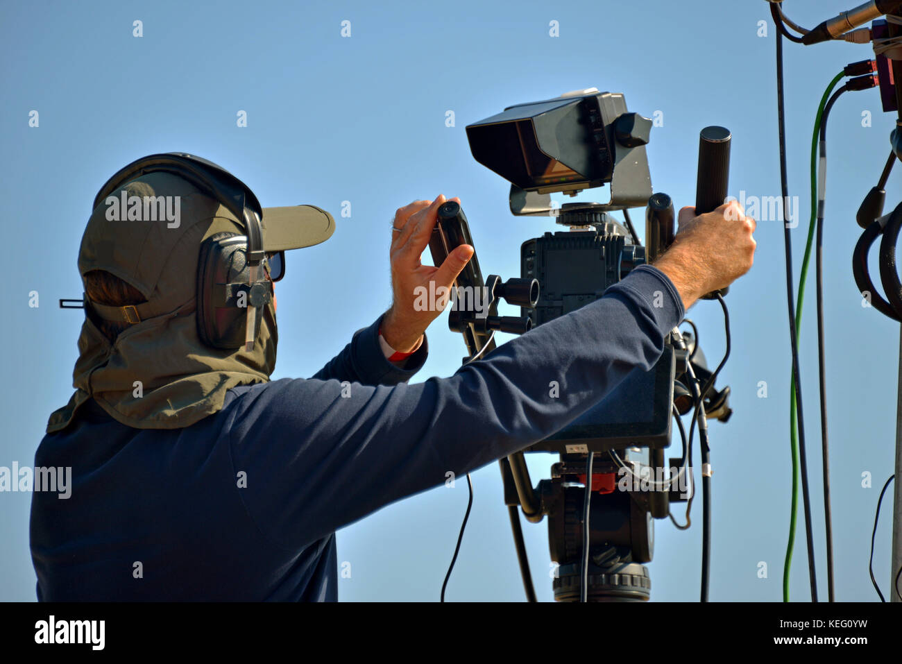 Video operator records the video on the video camera Stock Photo - Alamy