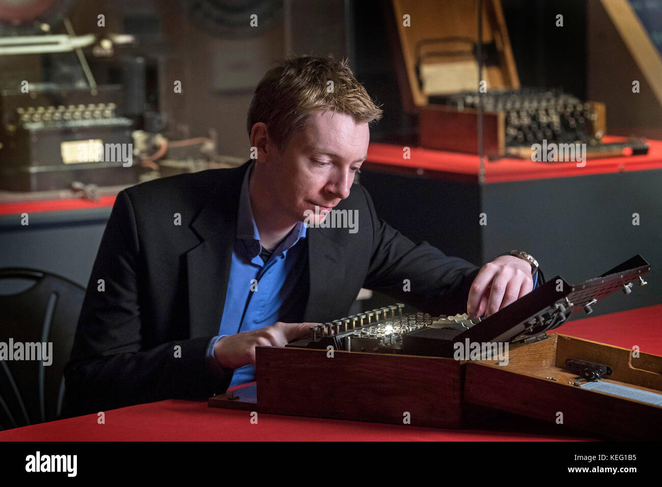 Enigma expert James Grime examines a working World War II Enigma ...
