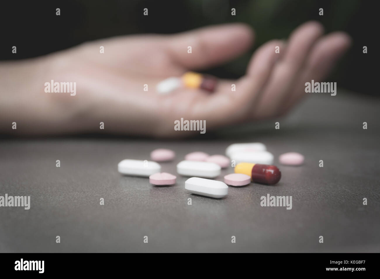 Young man suicide overdose medication drugs hi-res stock photography ...