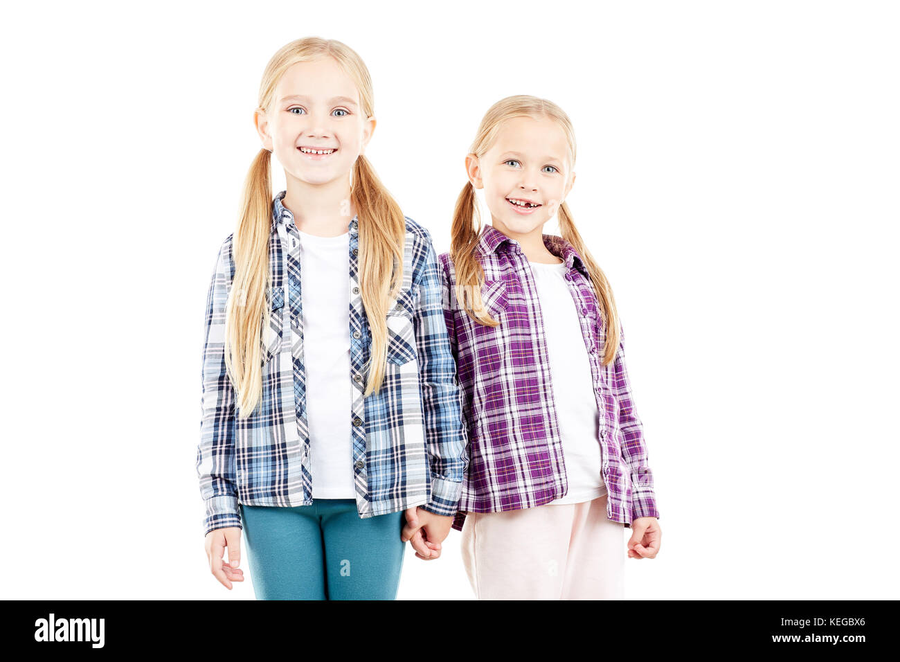 Cute little sisters Stock Photo - Alamy