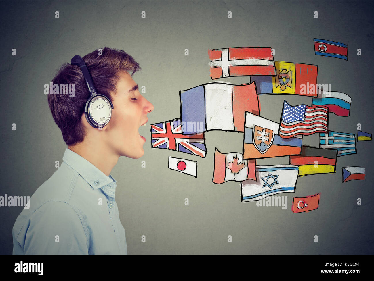 Young man learning different languages Stock Photo - Alamy